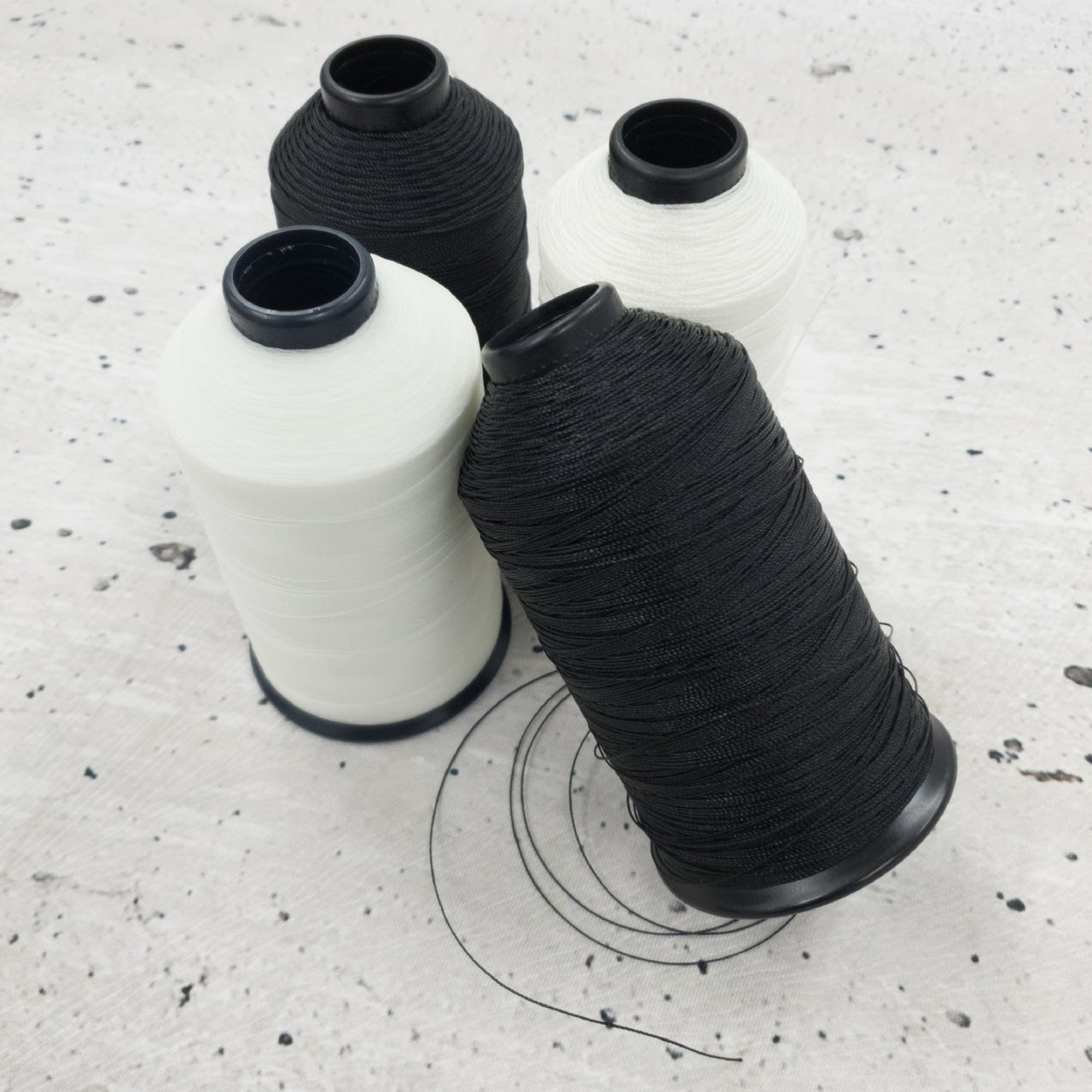 Black and White, Bonded Nylon 8oz, Sewing Machine Spools | The Leather Guy